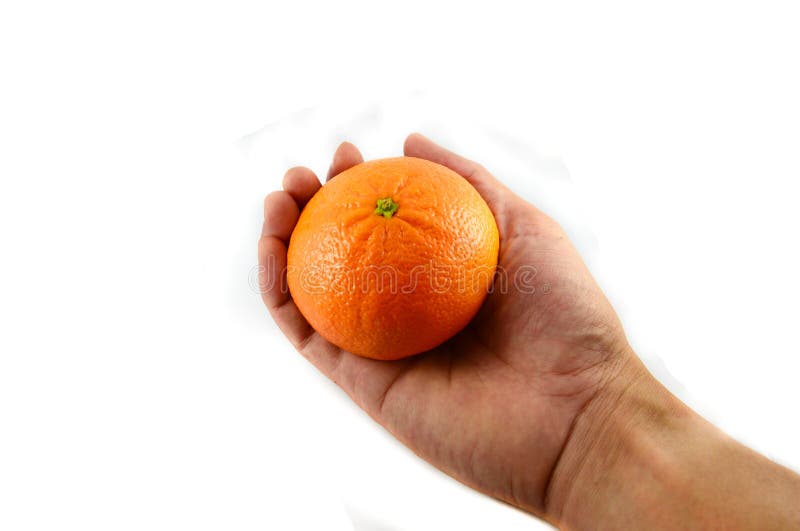 Orange in hand stock image. Image of healthy, leaf, white - 56177931