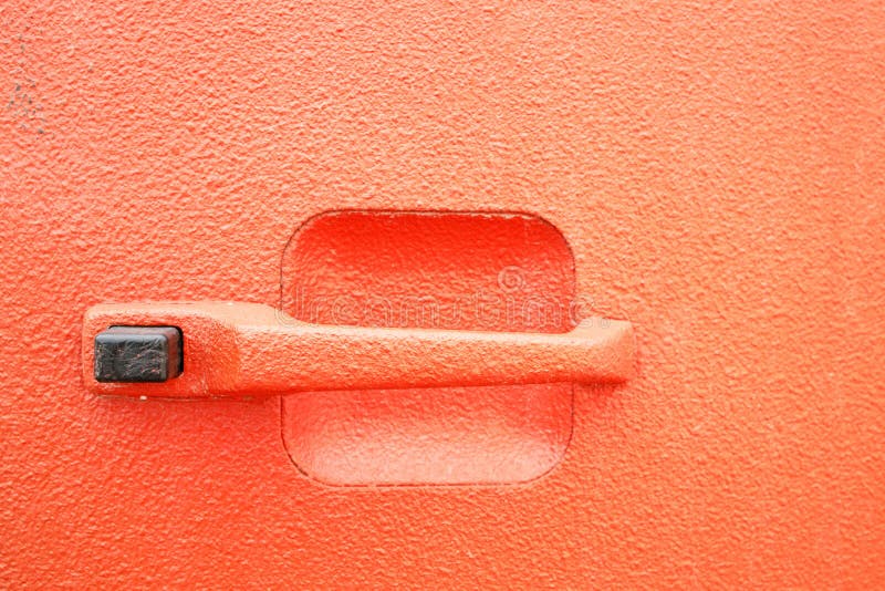 An Orange Handle on an Old Car is Orange with a Black Button Stock ...