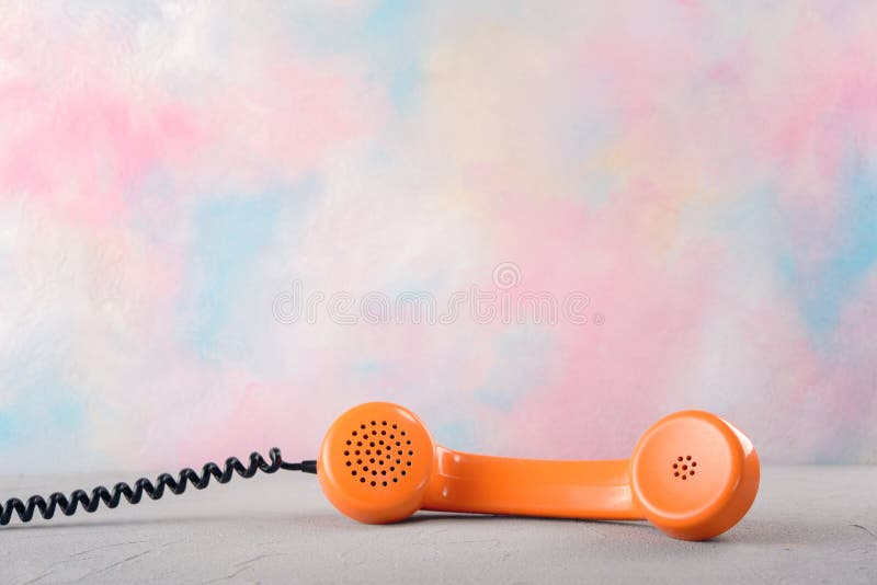 Orange Handset on the Table Stock Photo - Image of idea, office: 146550760