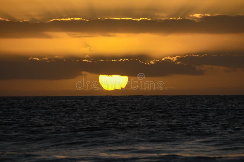 Orange Hard Sun stock photo. Image of horizon, light - 37851024