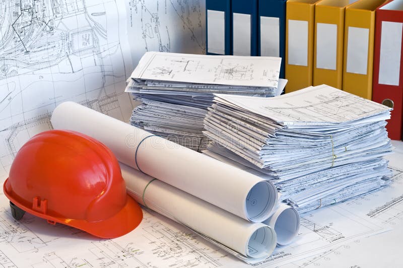 Orange Helmet and Heap of Project Drawings Stock Image - Image of ...