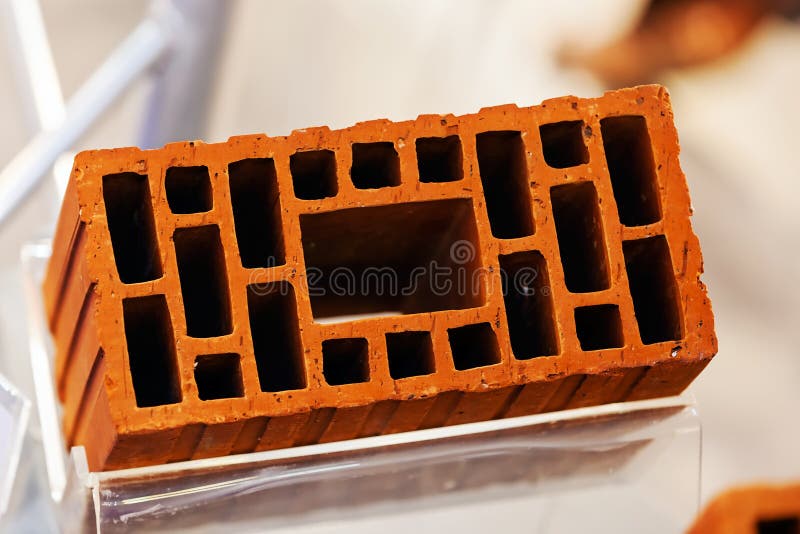 Orange hollow clay block stock photo. Image of background - 65114692