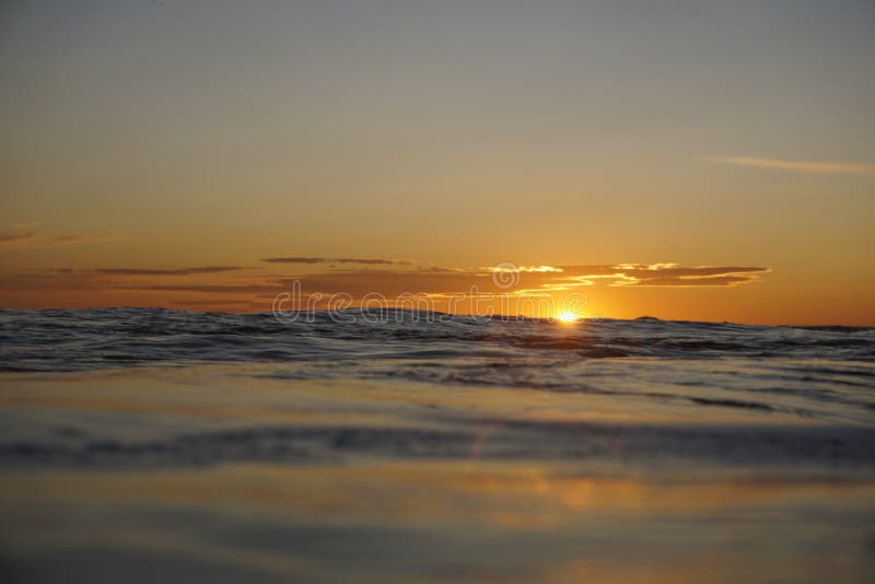 Orange Horizon during a Relaxing Sunset Stock Photo - Image of water ...