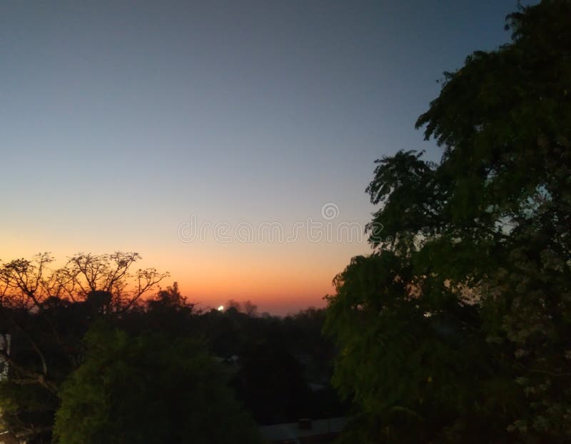 Orange hue Sunset Evening stock photo. Image of orangesky - 280393614