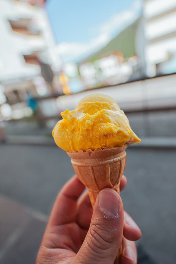 Orange Ice Cream Ball in a Ice Cream Cone Stock Image - Image of season, obst: 332697939