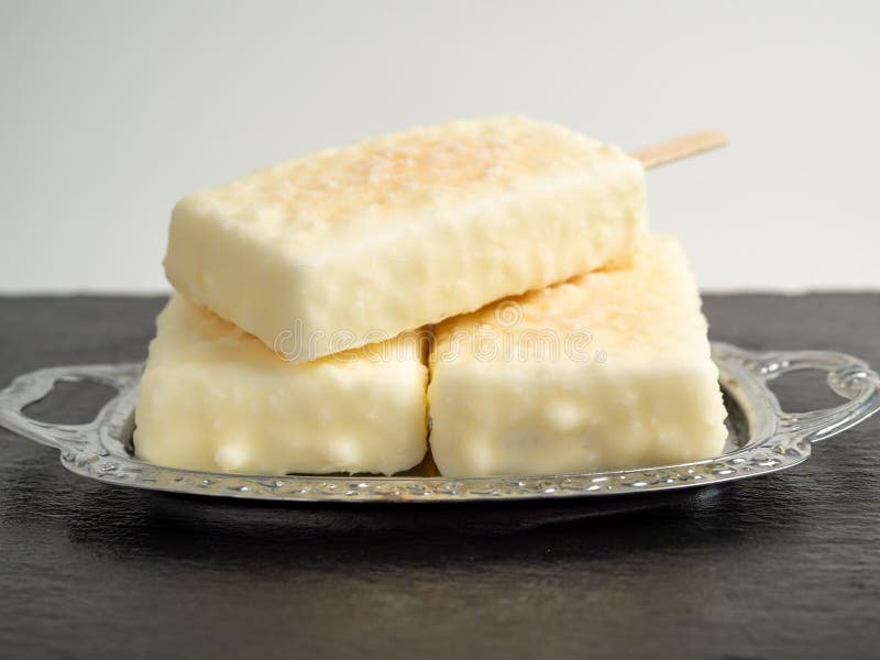 Orange Ice Cream with White Milk Chocolate. Stock Image - Image of ...