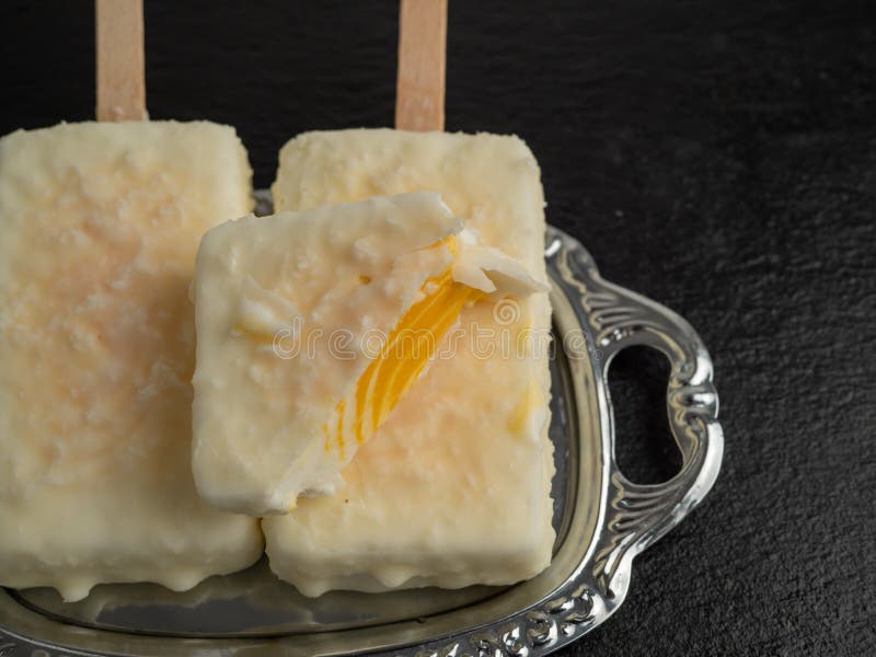 Orange Ice Cream with White Milk Chocolate. Stock Image - Image of ...