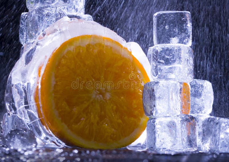 Orange with ice cubes stock photo. Image of cube, fleshy - 2169378