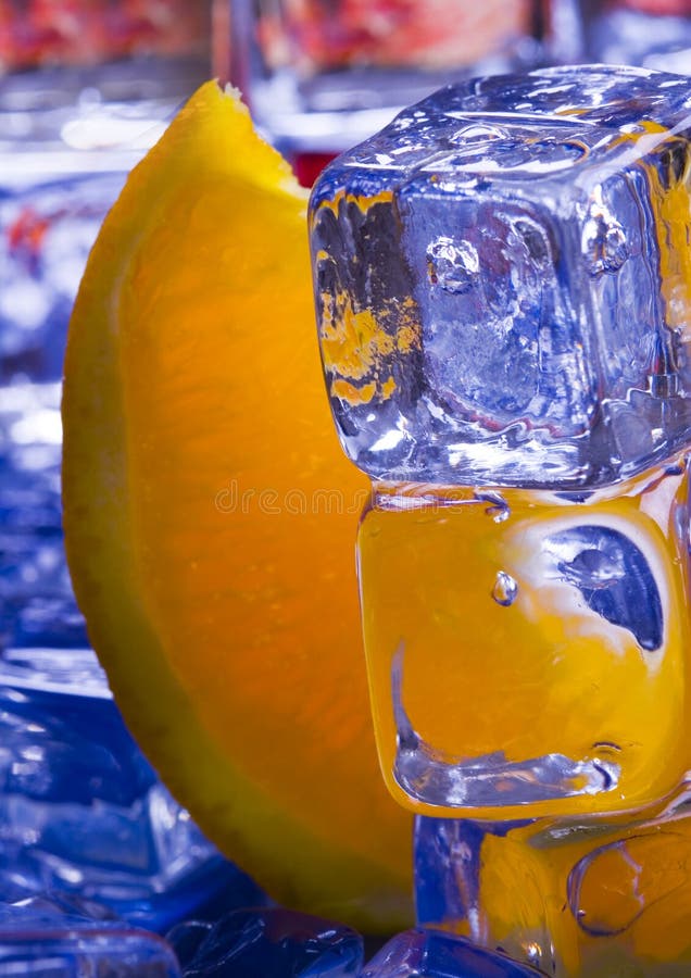 Orange with ice cubes stock image. Image of ingredients - 2169517