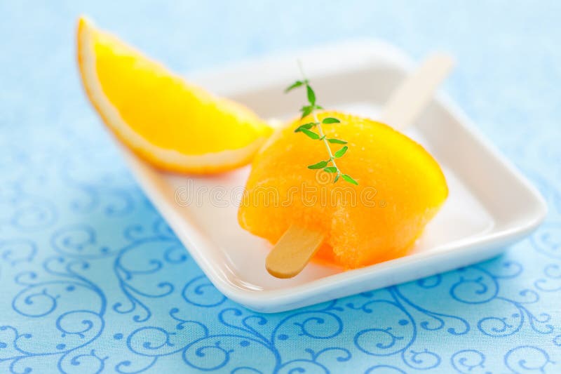 Orange ice lollies stock image. Image of stick, snack - 25426049