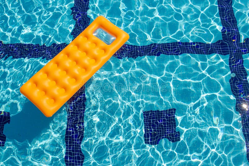 Orange Inflatable Mattress in the Pool. Stock Photo - Image of leisure ...