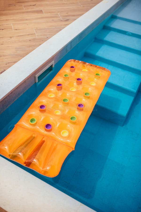 Orange Inflatable Mattress in the Pool Stock Image - Image of vacation ...