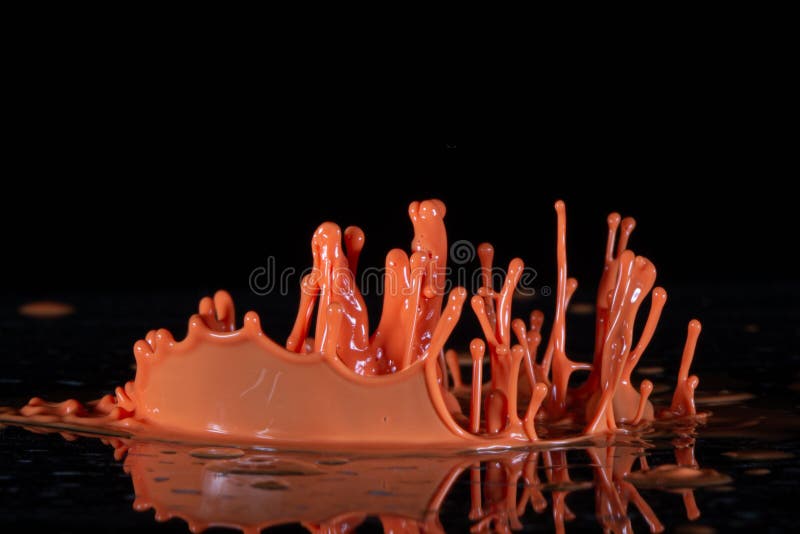 Orange Ink Splash on a Black Background Stock Image - Image of colorful ...