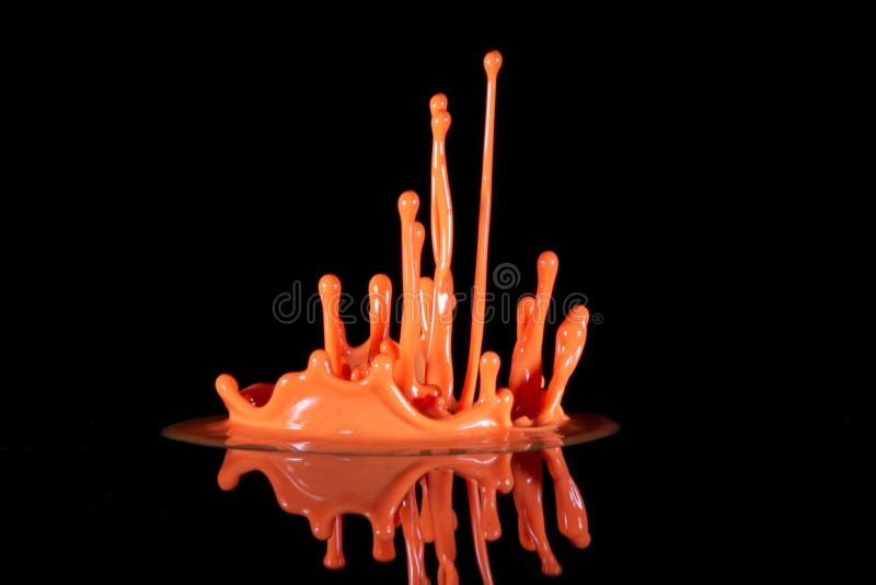 Orange Ink Splash on a Black Background Stock Photo - Image of artistic ...
