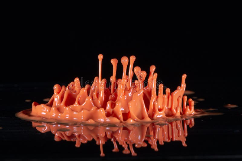 Orange Ink Splash on a Black Background Stock Image - Image of breaking ...