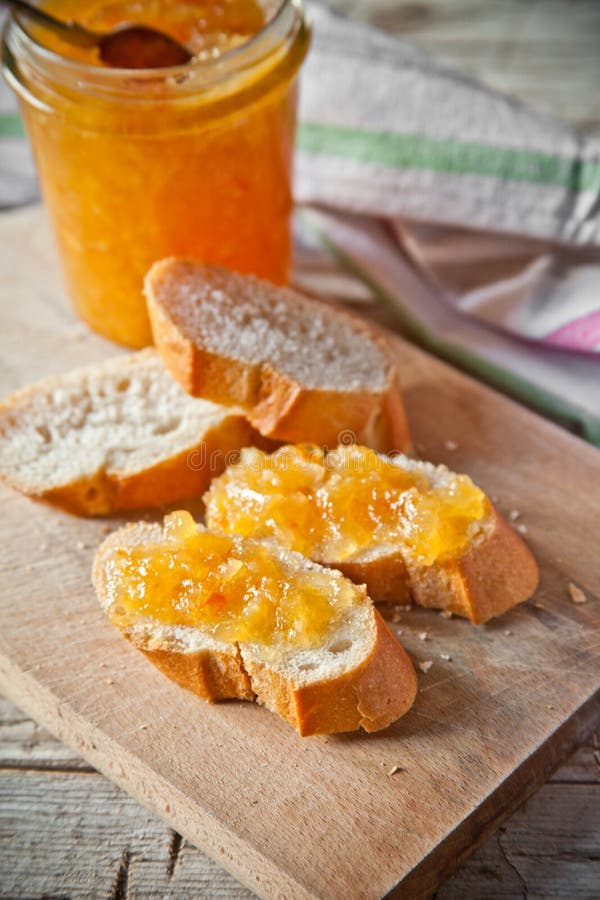 Orange Jam in a Glass Jar and Bread Stock Photo - Image of ripe ...