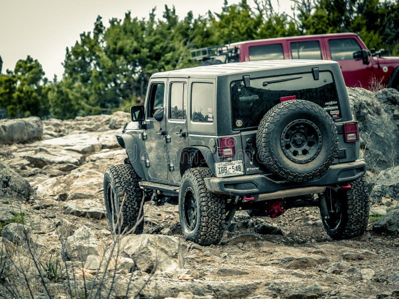 Orange Jeep Rock Crawling editorial stock image. Image of granit ...