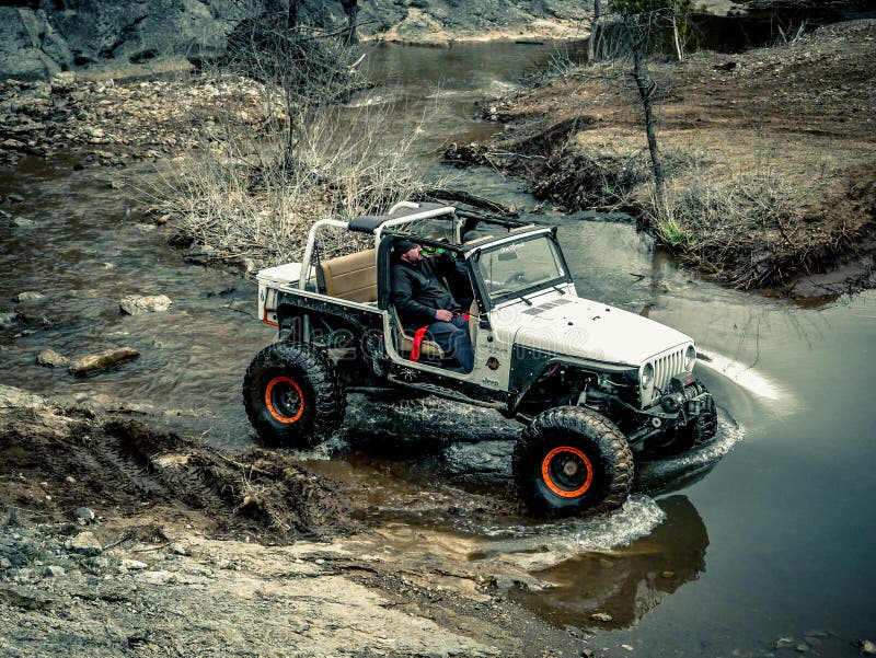 Orange Jeep Rock Crawling editorial stock image. Image of granit ...