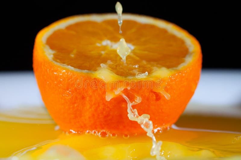 Orange juice drops. stock photo. Image of ripe, pouring - 28760450