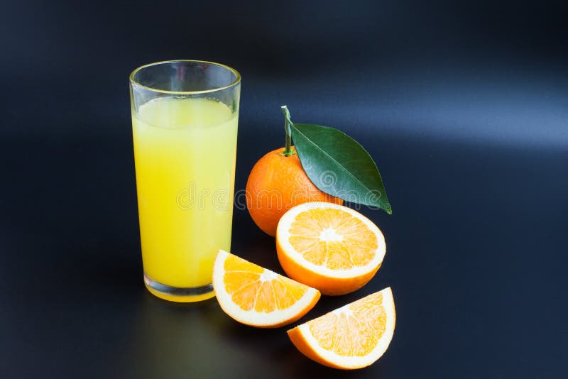 Orange Juice on a Black Background Stock Photo - Image of beverage ...