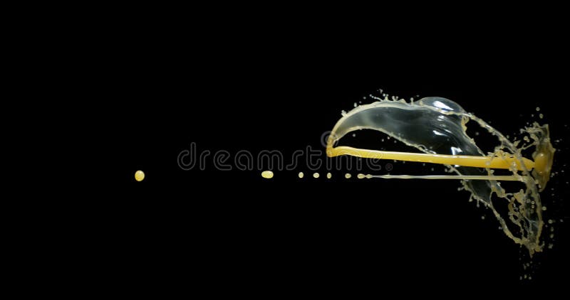 Orange Juice Exploding and Splashing on Black Background, Slow Motion ...