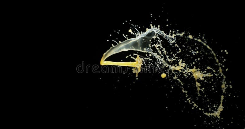 Orange Juice Exploding and Splashing on Black Background, Slow Motion ...
