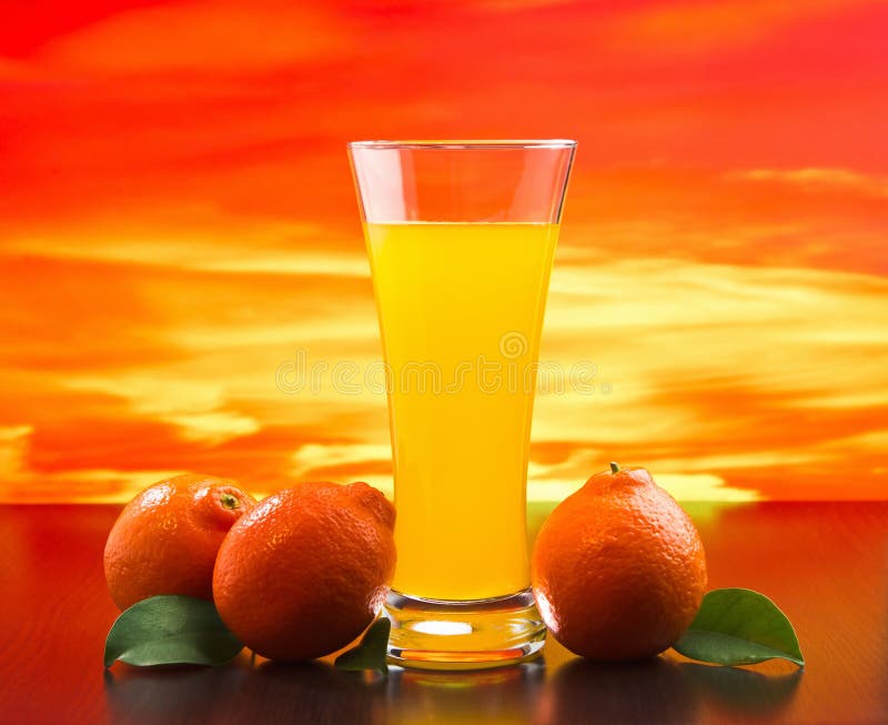 Orange Juice in a Glass on a Table Stock Image - Image of slices ...
