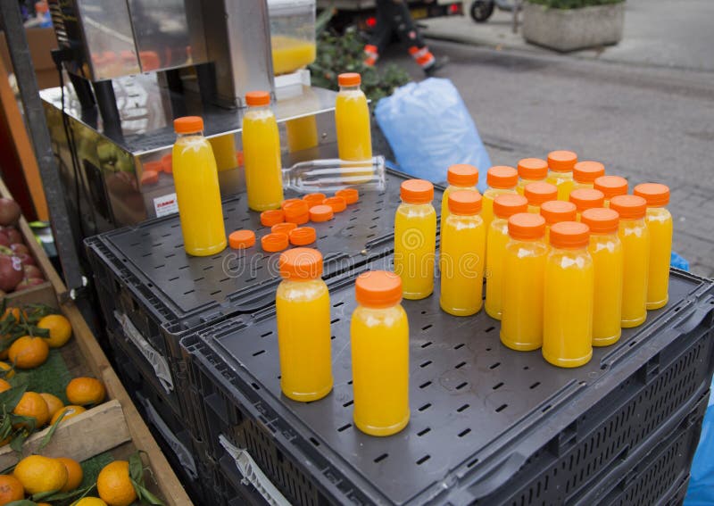 Orange juice on the market stock image. Image of yellow - 91072775