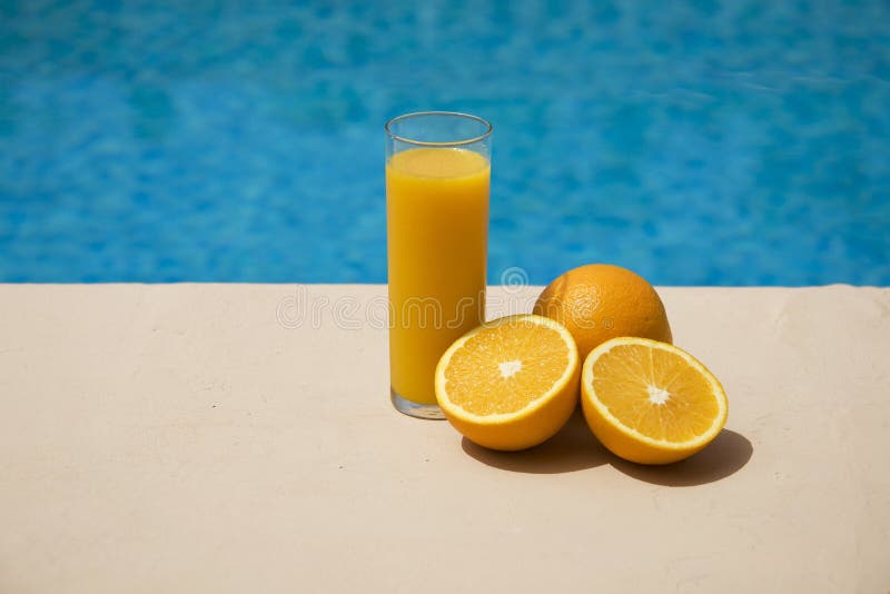 Orange Juice at the Poolside Stock Photo - Image of holiday, pool: 3031840