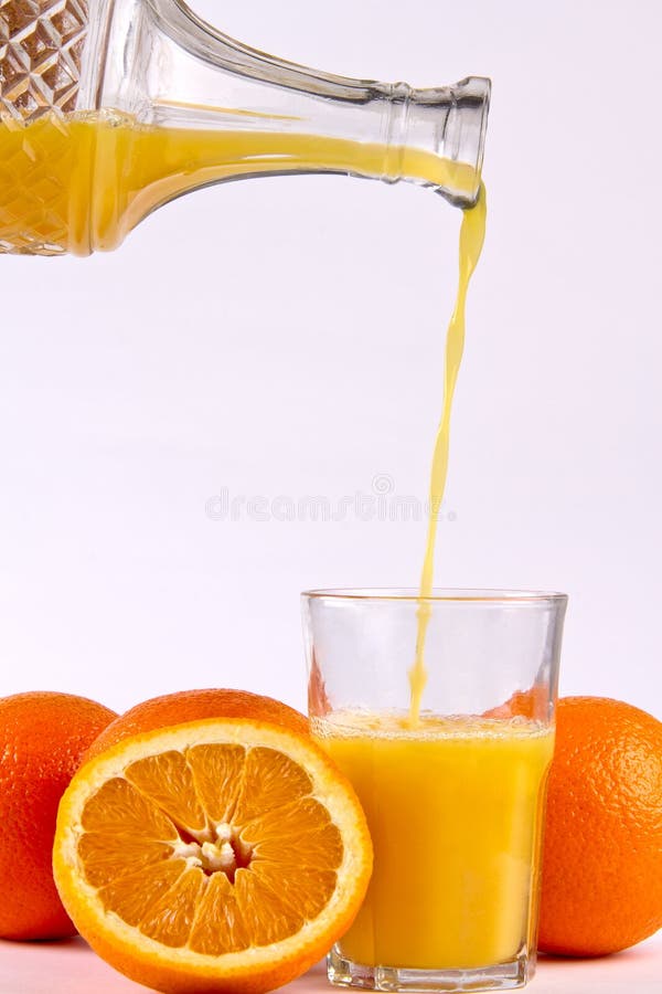 Orange Juice Dripping into Glass from Orange Fruit Stock Photo - Image ...