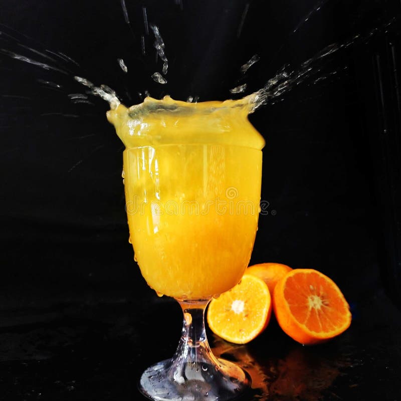 Orange Juice Splash Isolated on Black Background Stock Image - Image of ...