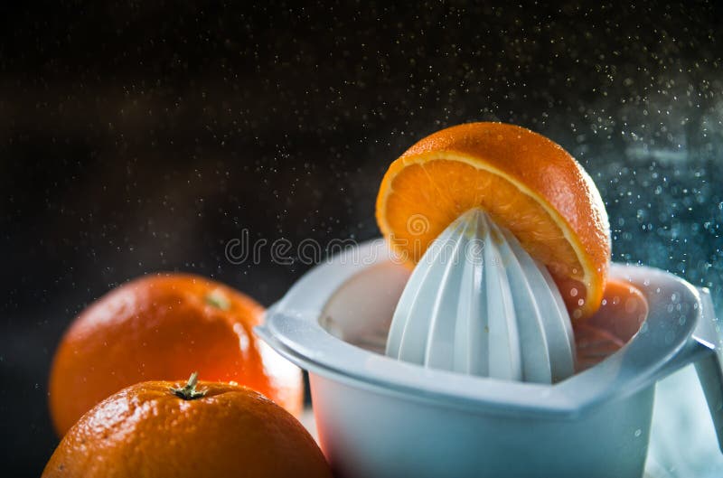 Orange juice squeeze out stock photo. Image of fruits - 37231116