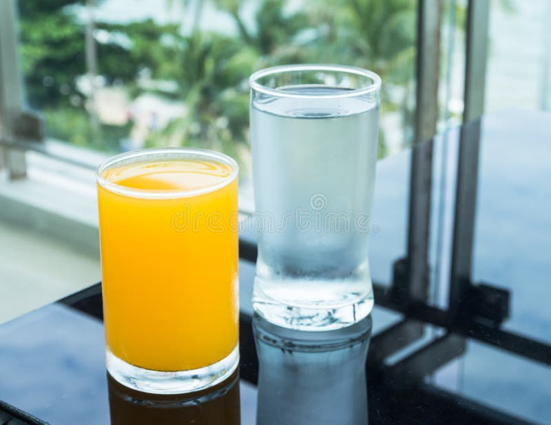 Orange Juice and Water on Table Stock Image - Image of healthy, water ...