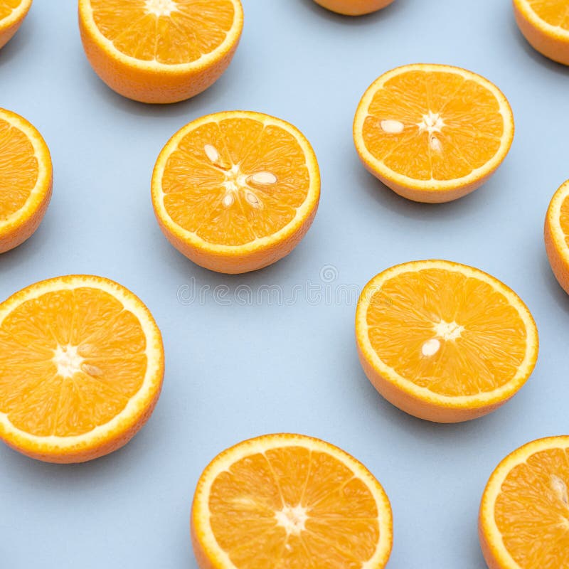 Orange Juicy Oranges Split In Half On Blue Stock Image - Image of ripe ...