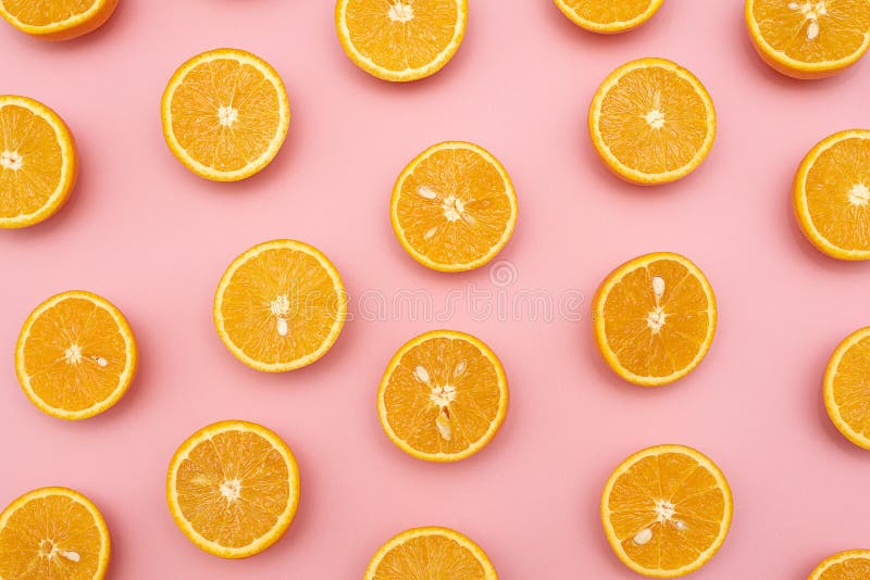Orange Juicy Oranges Split in Half on Pink Stock Image - Image of ...