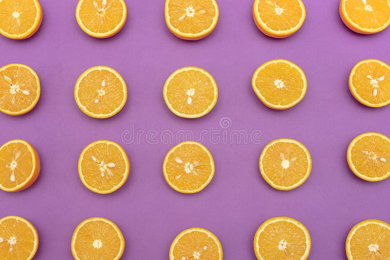 Orange Juicy Oranges Split in Half on Purple Stock Image - Image of ...