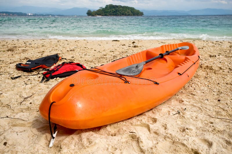 Orange Kayak stock photo. Image of blue, landscape, kayaking - 12177416