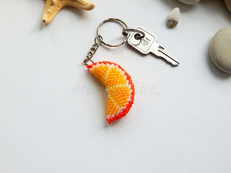Orange Key Chain and Stones Stock Image - Image of decorative, pattern ...