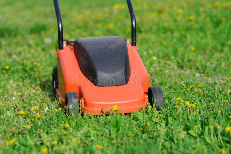 Orange lawn mower stock photo. Image of lawn, garden - 25315490