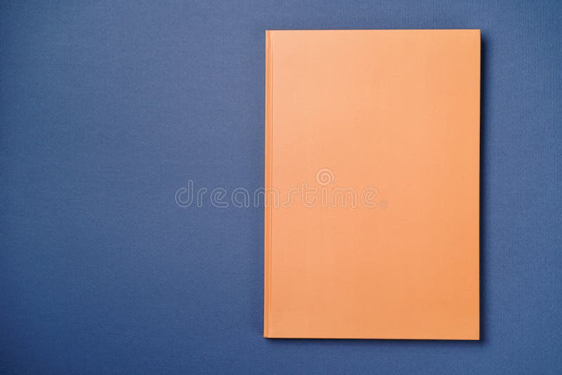 Orange Leather Notebook on a Intense Blue Background Stock Photo ...