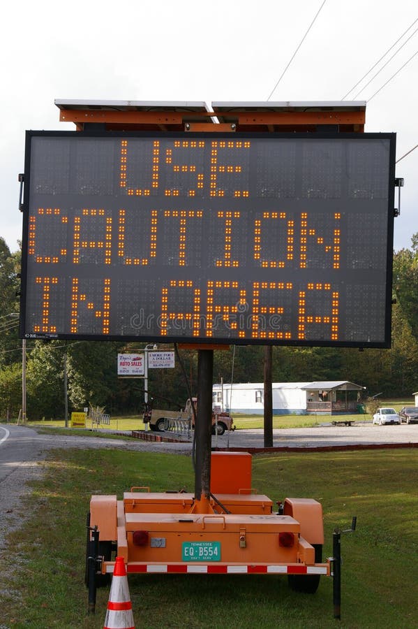 LED Caution Sign on Side of Highway Editorial Photo - Image of warning ...