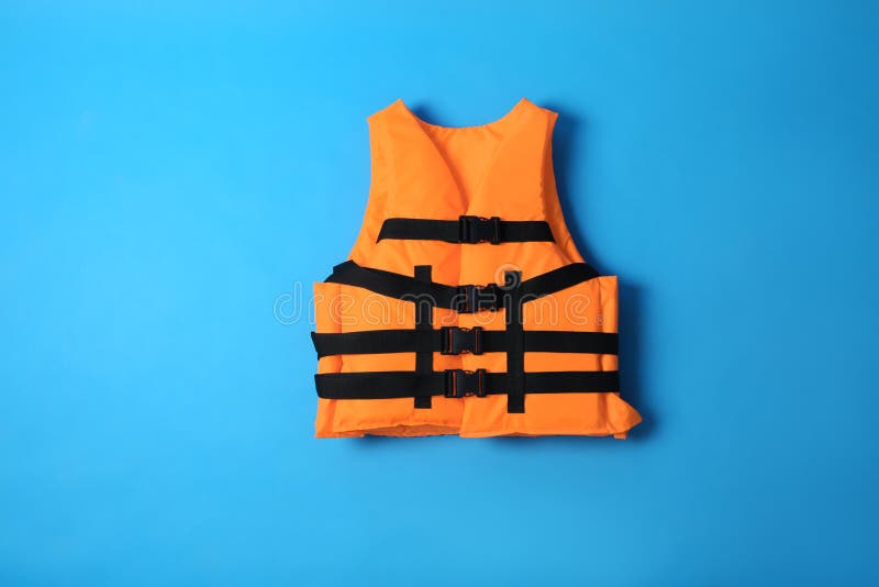 Orange Life Jacket on Blue Background. Personal Flotation Device Stock ...