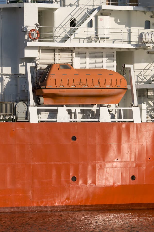 Orange Lifeboat on Deck of Cruise Ship Stock Photo - Image of hanging ...