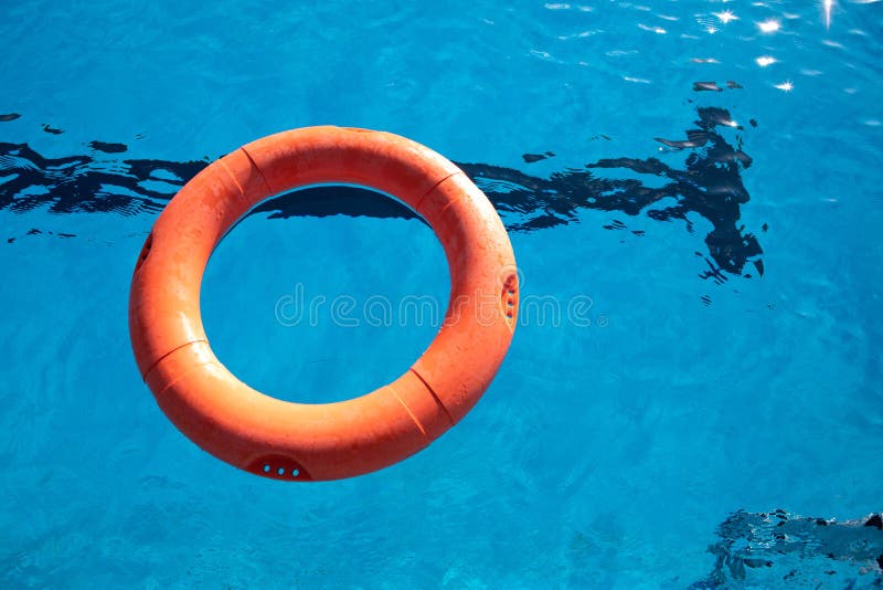 Orange Lifebuoy Floating on a Pool Stock Photo - Image of floating ...