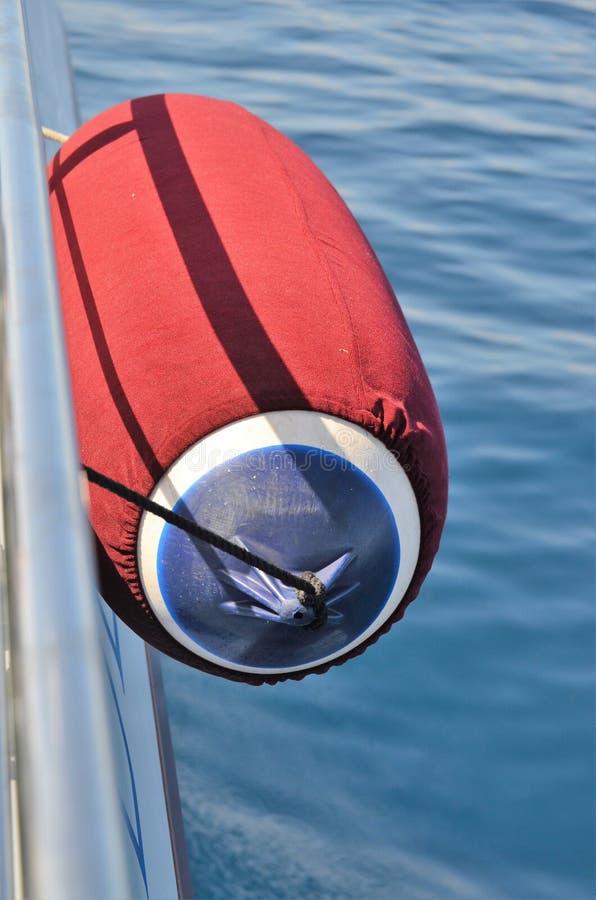 Orange Lifebuoy Hanging on the Back of the Boat Stock Photo - Image of ...