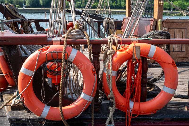Orange Lifebuoys on Old Sailboat Stock Photo - Image of sailboat ...