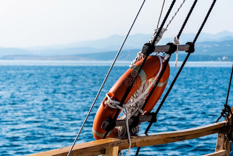 Orange Lifeline Ring on a Boat Stock Image - Image of lifeguard, float ...