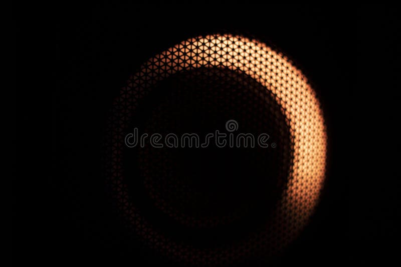 Orange Light in Dark. Glow through Grid Stock Photo - Image of blur ...