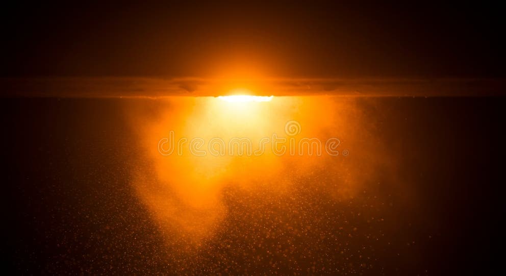 Orange Light Glow on Dark Background Stock Photo - Image of particle ...