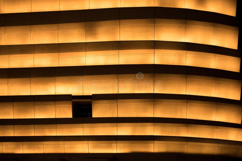 Orange Light at Night on the Wall Stock Image - Image of block, dark ...